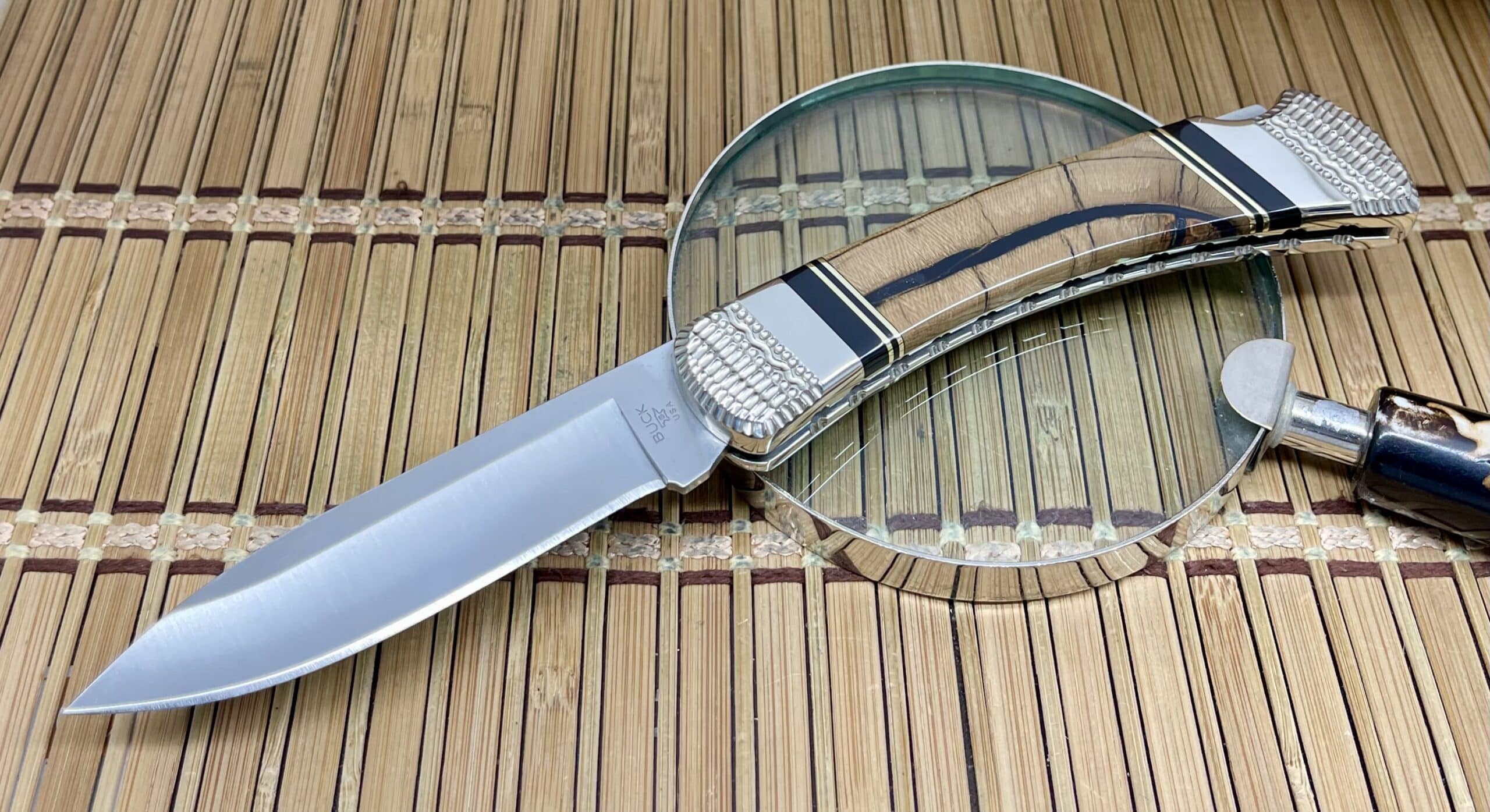 buck 110 custom mammoth fossil folding hunter Wild Horse