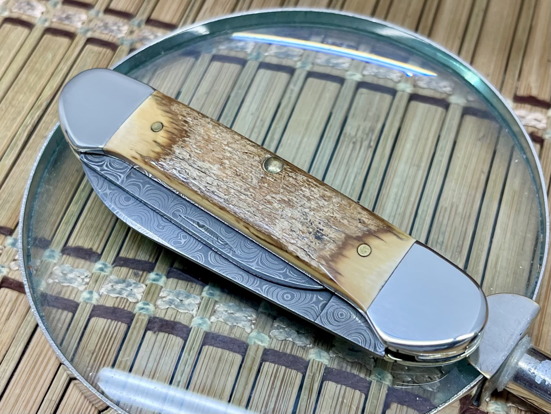 case mammoth bark fossil raindrop damascus canoe Wild Horse